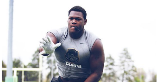 This massive five-star OT shows off athleticism in his 354-pound frame ...