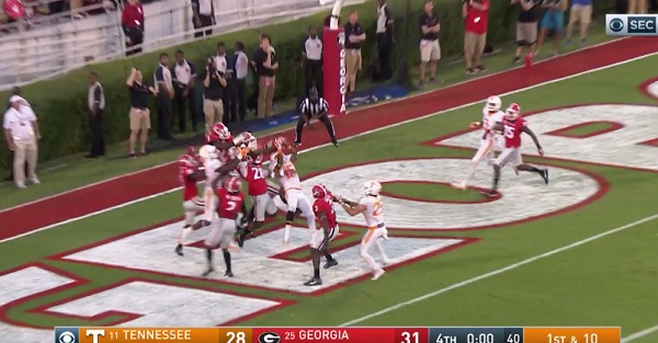 WATCH: Tennessee stuns Georgia on Hail Mary in Athens - FanBuzz