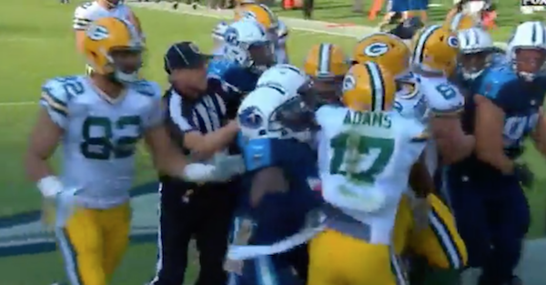 Late hit on Aaron Rodgers sparks massive scuffle between Titans-Packers ...