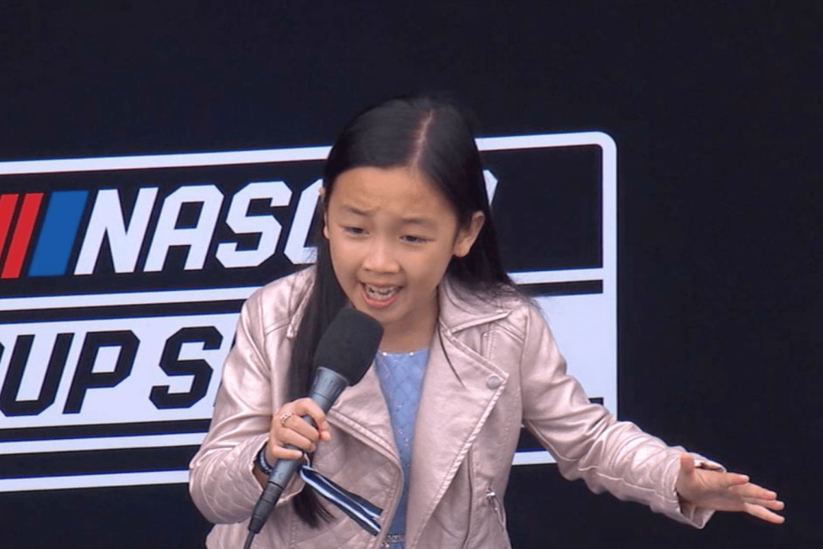 8-Year-Old Girl Belts Out the National Anthem Before NASCAR Race - FanBuzz