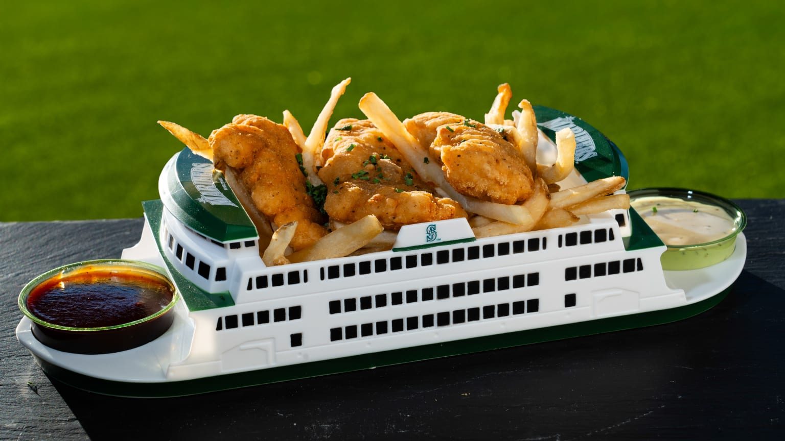 Baseball Team Selling a Toy Boat Filled With Food at Concession Stands ...